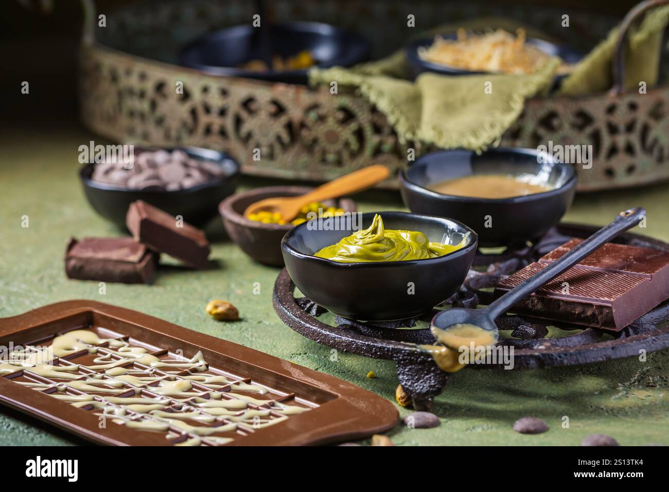 Preparing homemade Dubai chocolate with ingredients Stock Photo - Alamy