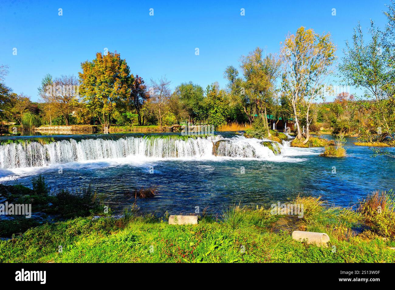 Small stream and waterfall in the preserved nature Stock Photo - Alamy