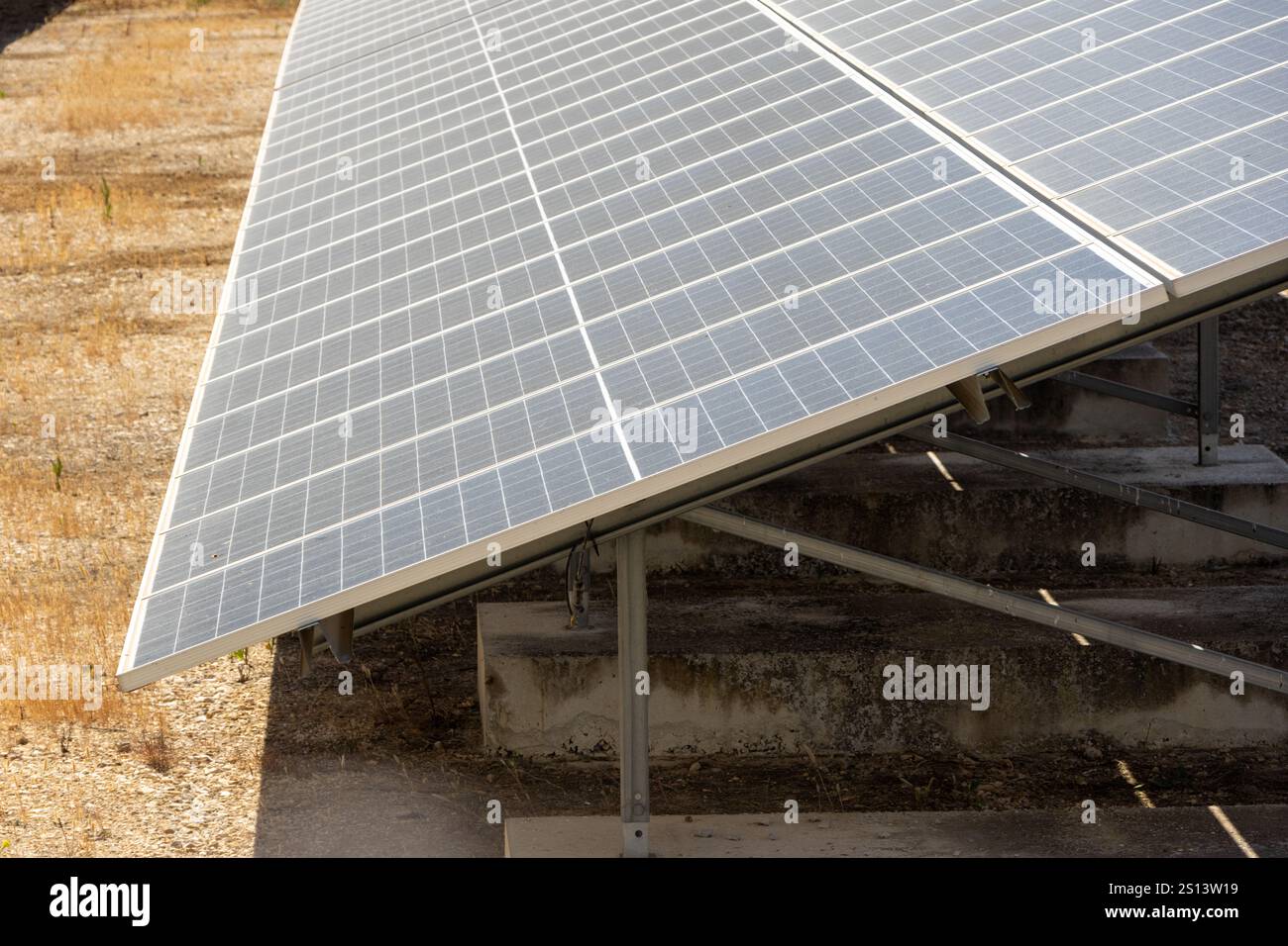 Solar panels are converting sunlight into renewable energy on dry ...