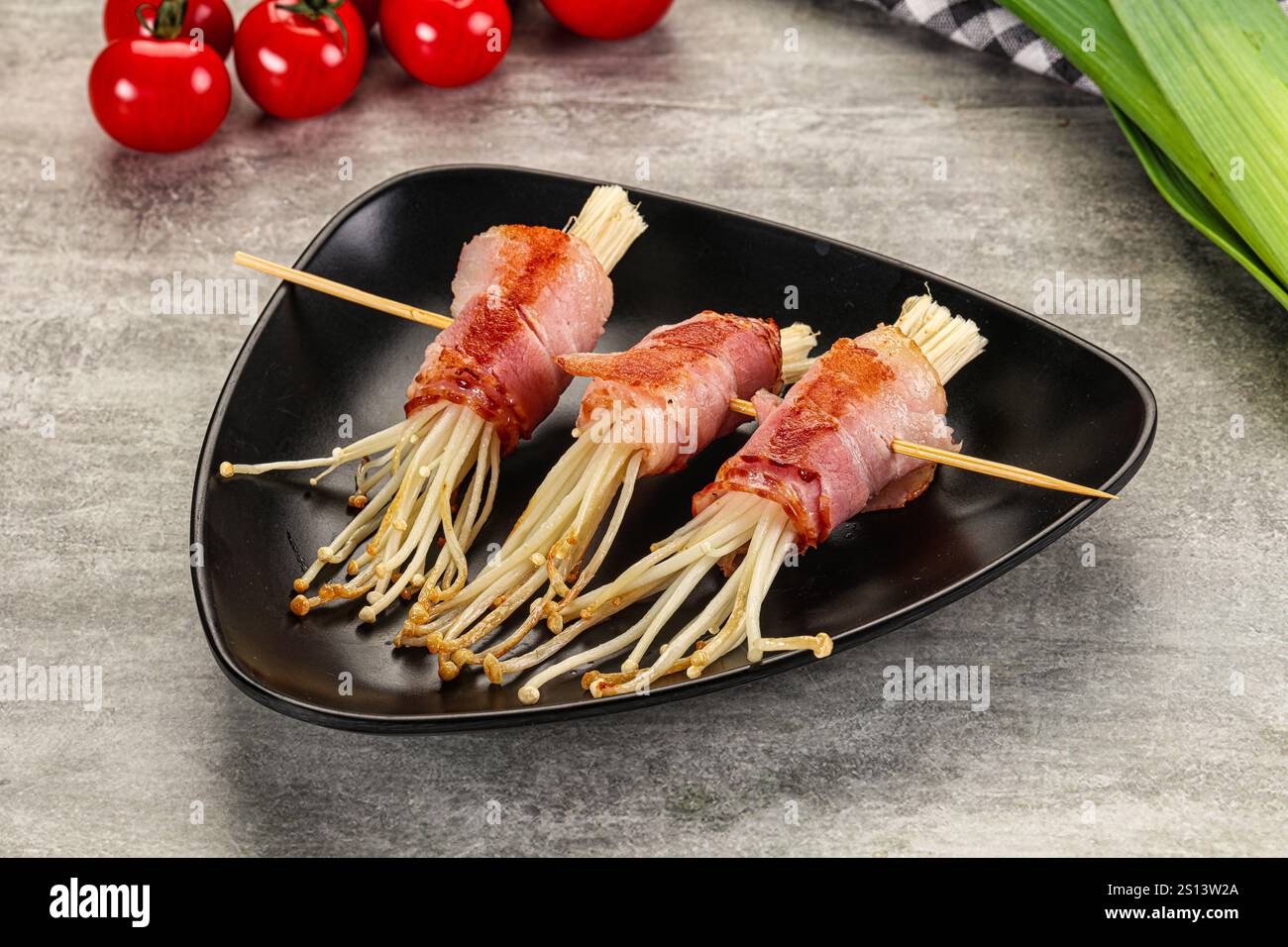 Grilled enoki mushroom with bacon roll wrap Stock Photo - Alamy