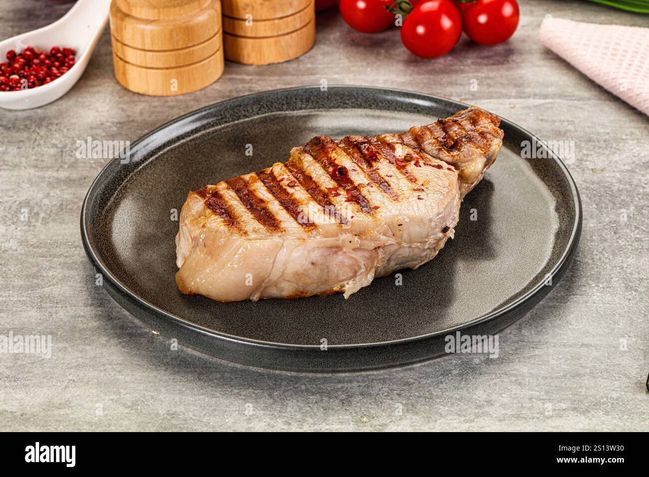 Grilled fat pork loin steak with bone Stock Photo - Alamy