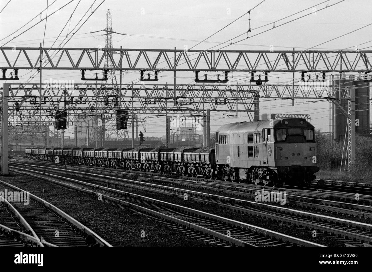 A Class 31 diesel locomotive number 31196 working a loaded ballast trip ...
