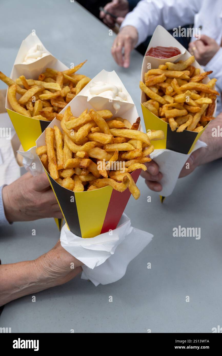 Belgian street and fast food, paper cone bag in colors of Belgian flag ...