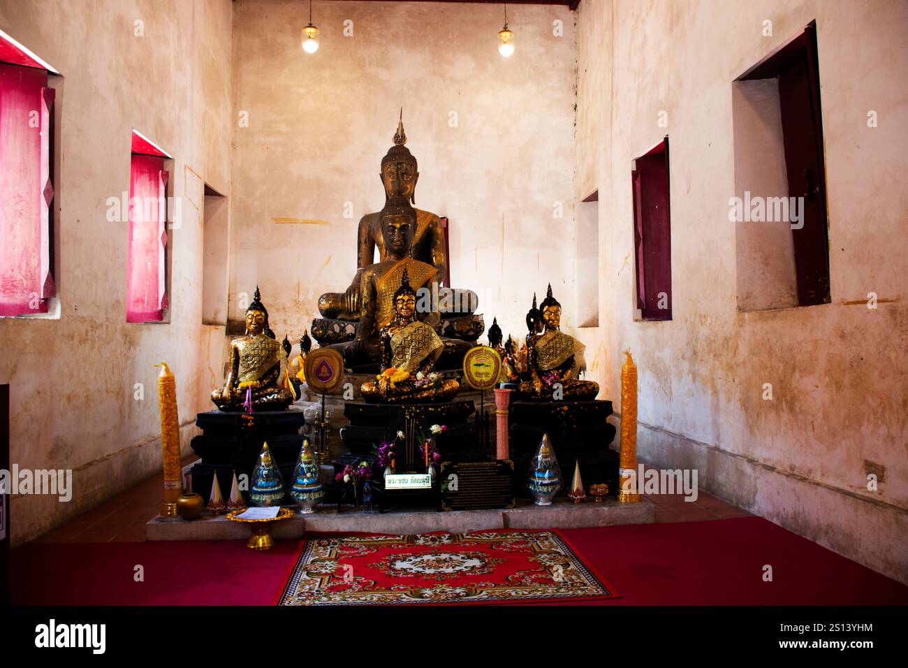 Holy ancient buddha statue Phra Phutta Rattana Munee in antique ubosot ...