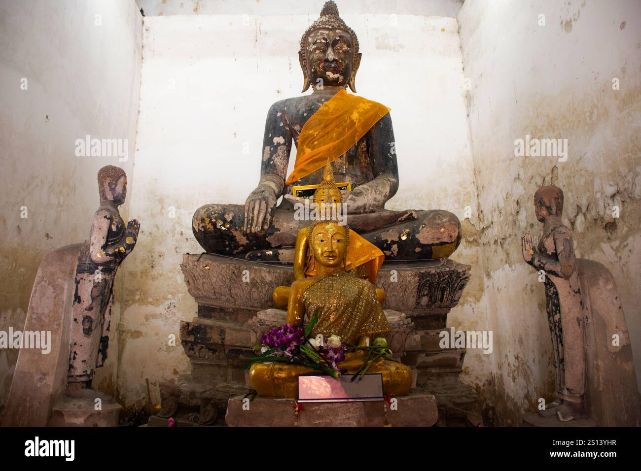 Holy ancient buddha statue Phra Phutta Sirimasaen in antique ubosot for ...