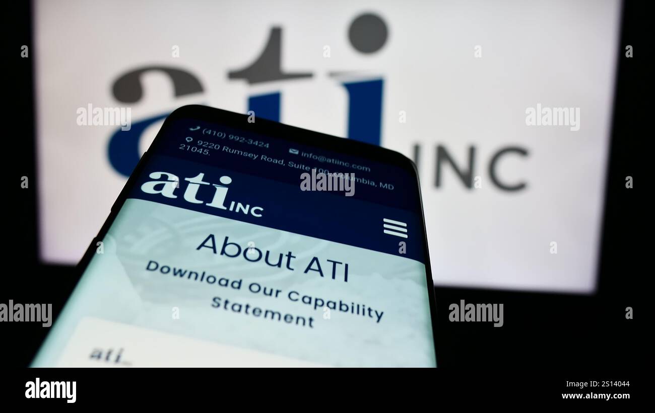 In this photo illustration, a mobile phone with the website of US ...