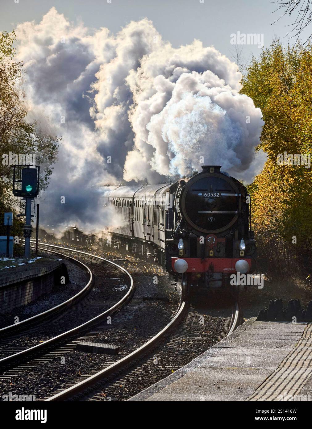 An old restored steam locomotive, Blue Peter, on a mainline rail tour ...