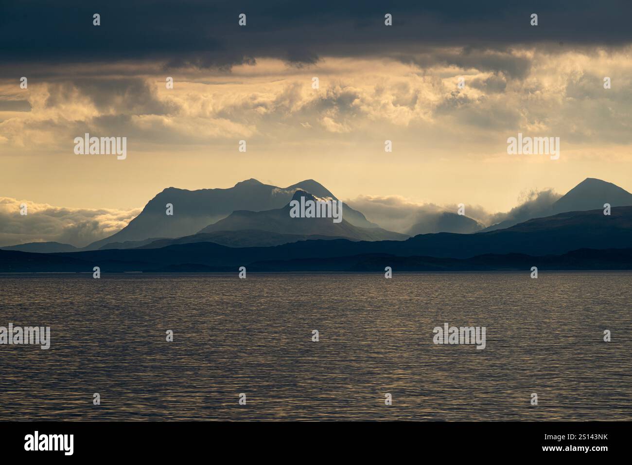 Sunrise over the Assynt mountains - taken from the Calmac ferry as it ...
