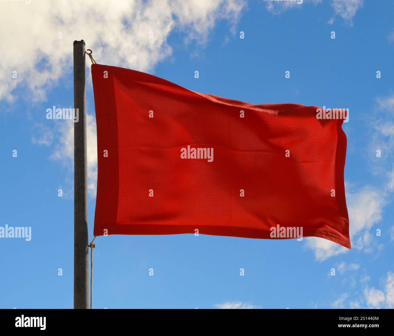 A red flag at the beach indicates danger and means you should not enter ...