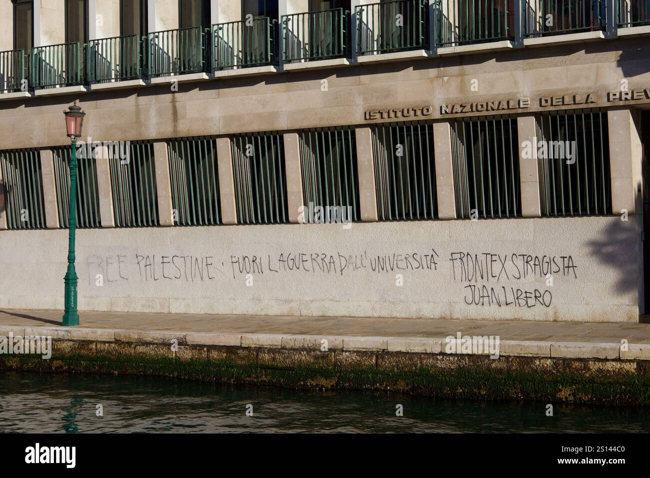 Venice, Italy. December 28, 2024. Political message written in Italian ...