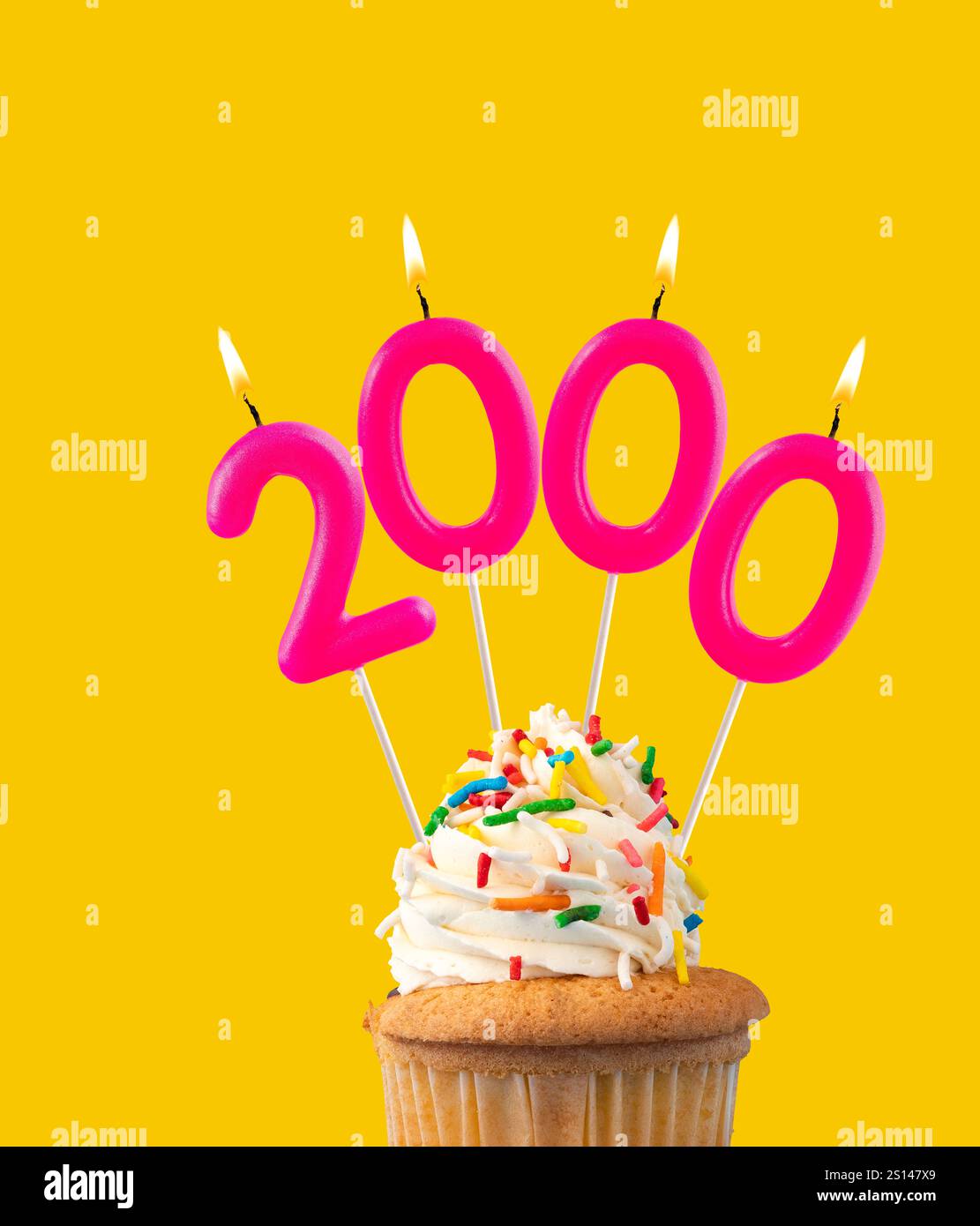 Candles forming the number 2000 - Yellow background Stock Photo - Alamy