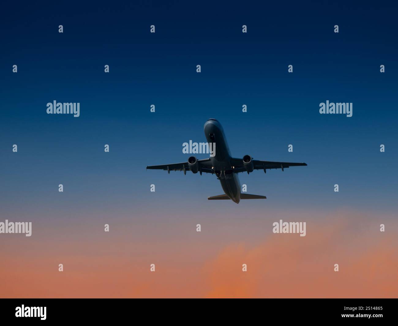 Aircraft take-off from airport at sunset time. Air transportation and ...