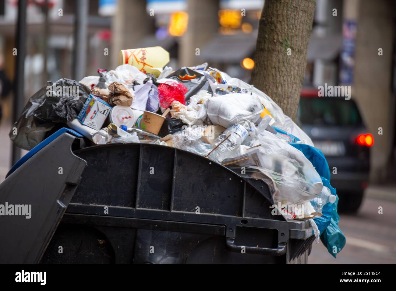 Residual waste bin is ready for emptying at the street Stock Photo - Alamy
