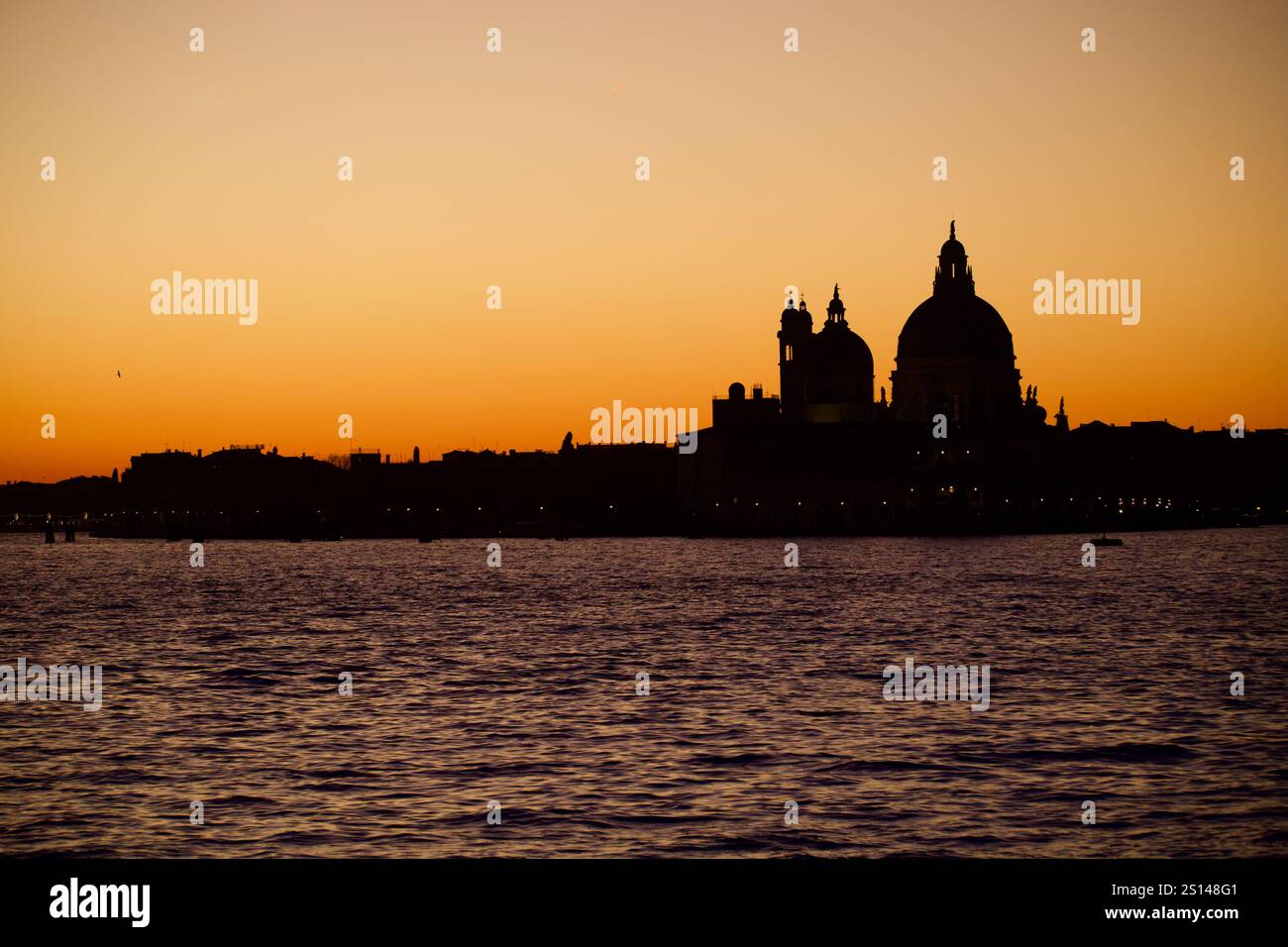 Venice, Italy. December 26, 2024. Sunset in Venice, Basilica Santa ...