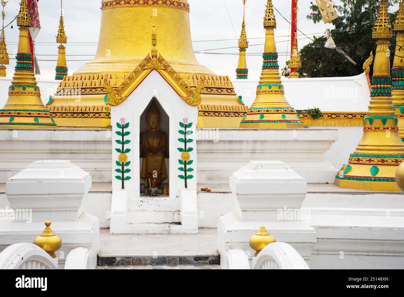 Antique old buddha statues in ancient stupa chedi mon raman style for ...