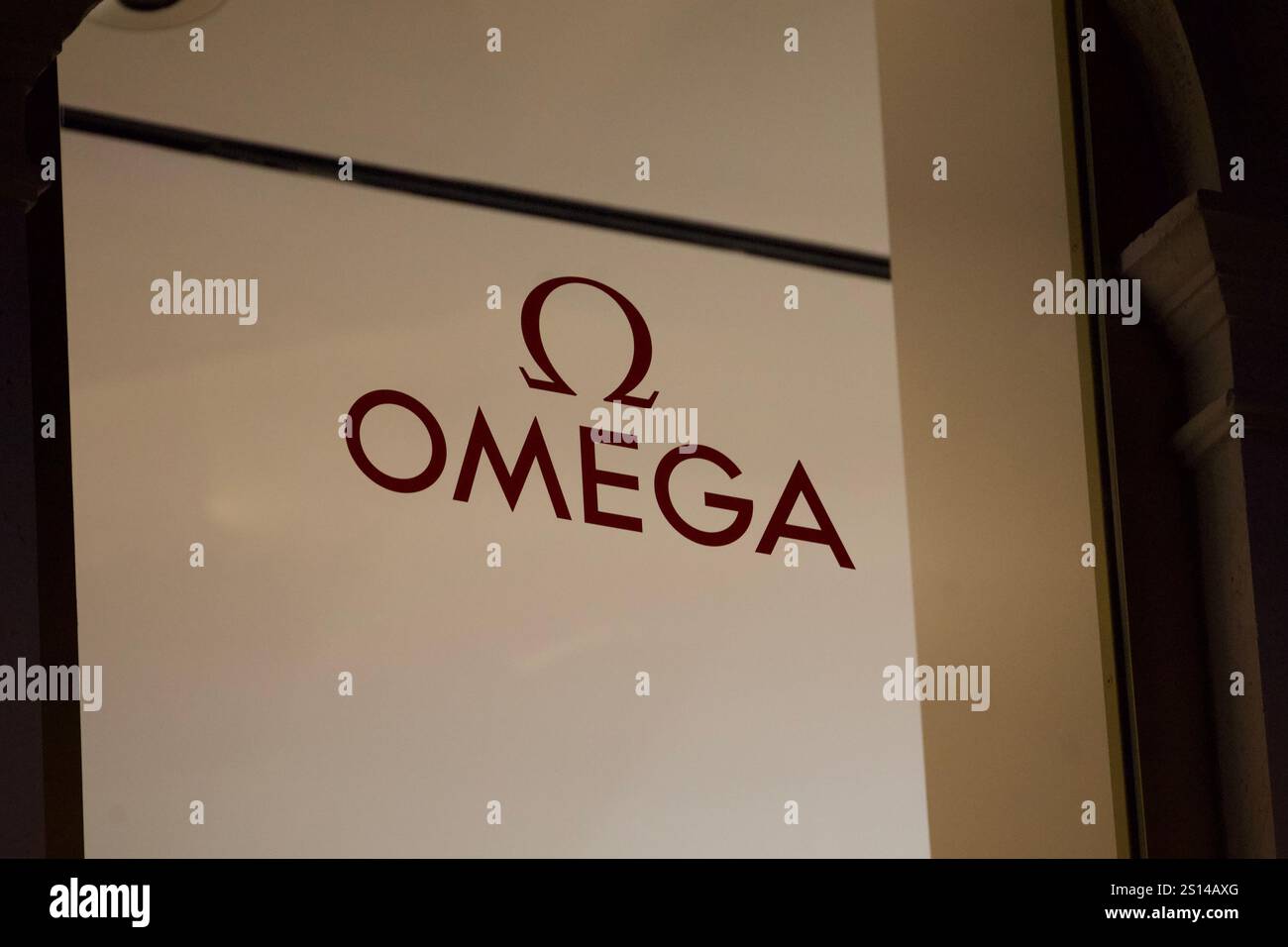 Venice, Italy. December 26, 2024. Omega sign on a window of an Omega ...