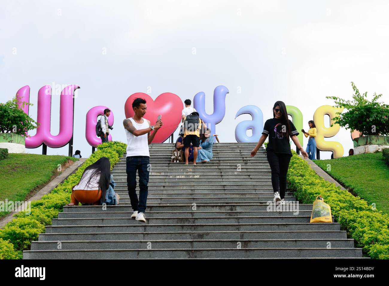 Yangon, Myanmar. 31st Dec, 2024. People visit the bank of Inya Lake in ...