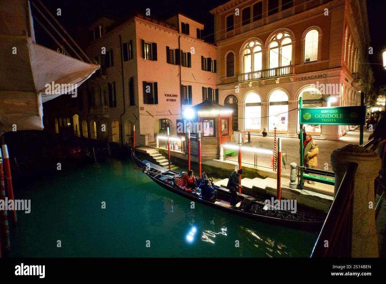 Venice, Italy. December 25, 2024. A Gondola at night Stock Photo - Alamy