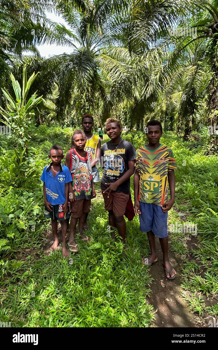 Portrait of a group of inhabitants of Talasea forest in Willaumez ...