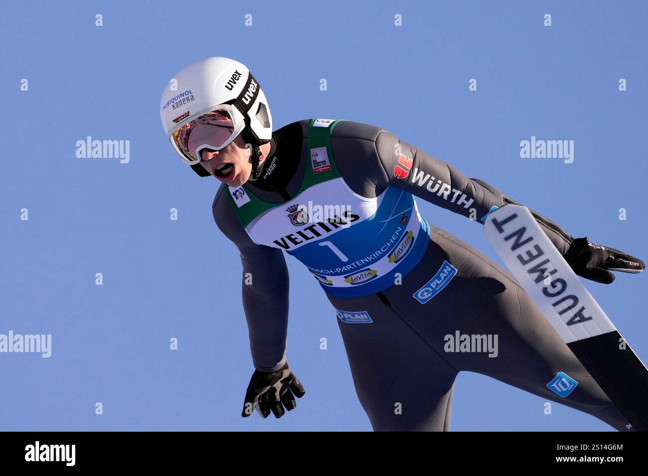 Luca Roth, of Germany, soars through the air during his qualification ...