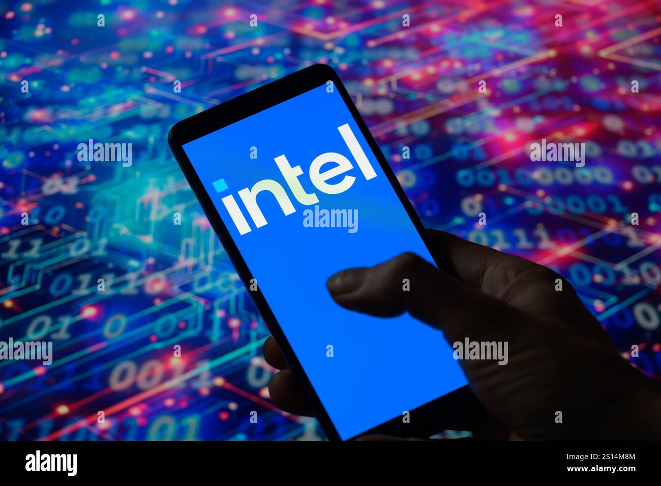The Intel logo is being displayed on a mobile screen, in this photo ...