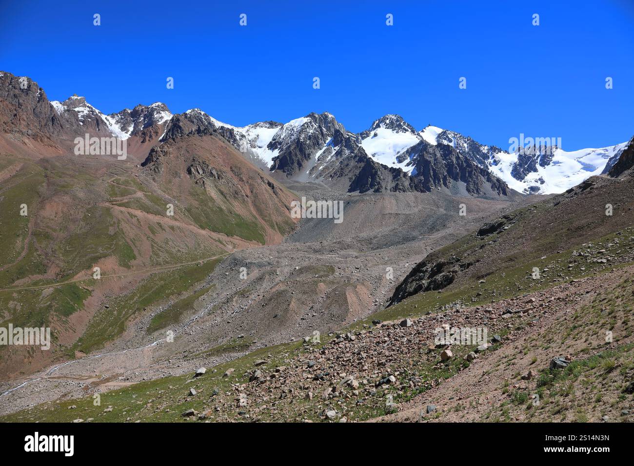 Stunning view of the mountain peaks of Tien Shan covered with ice ...