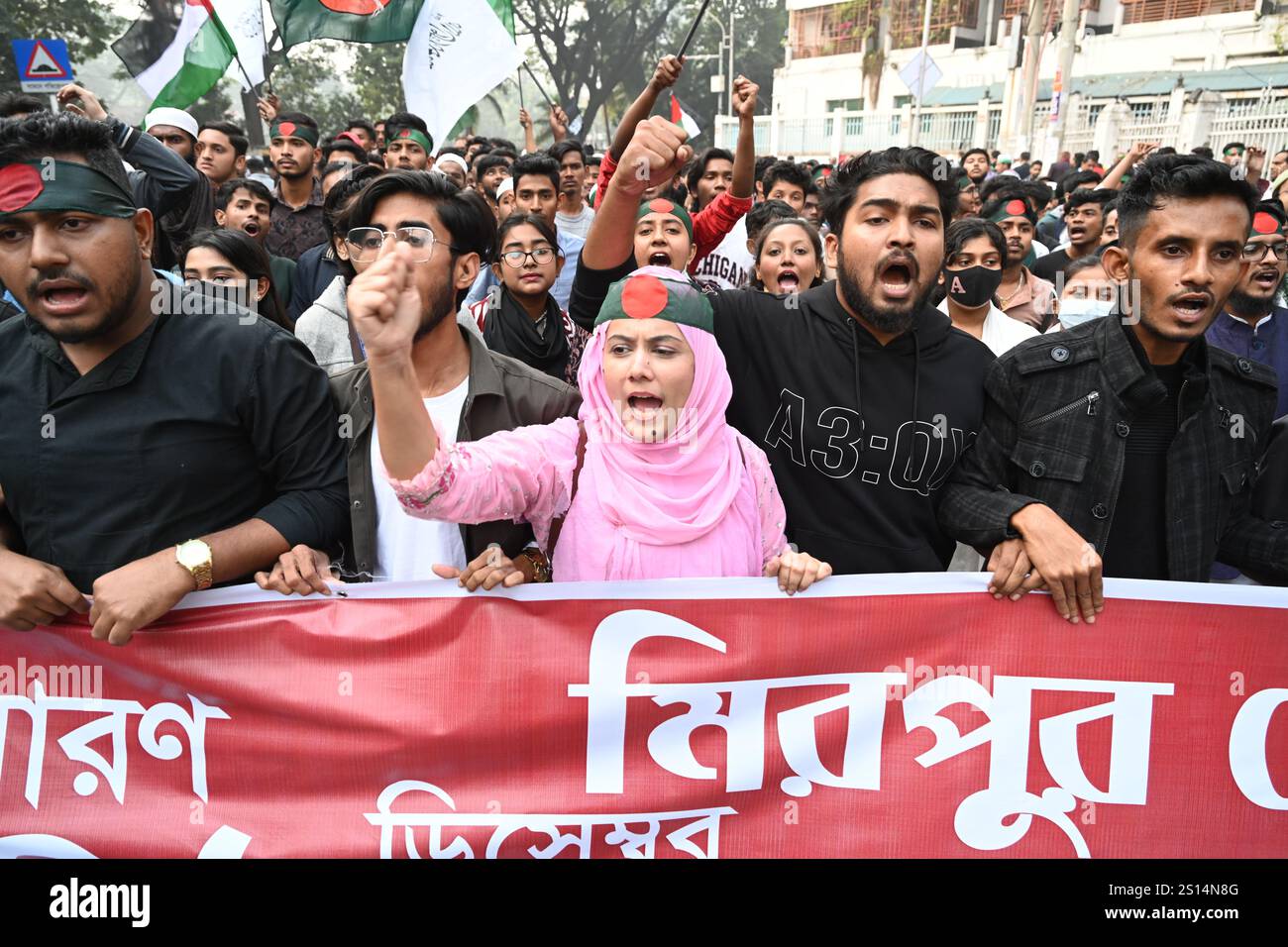 Dhaka, Bangladesh. 31st Dec, 2024. Students and supporters shout slogans during the 'March for ...