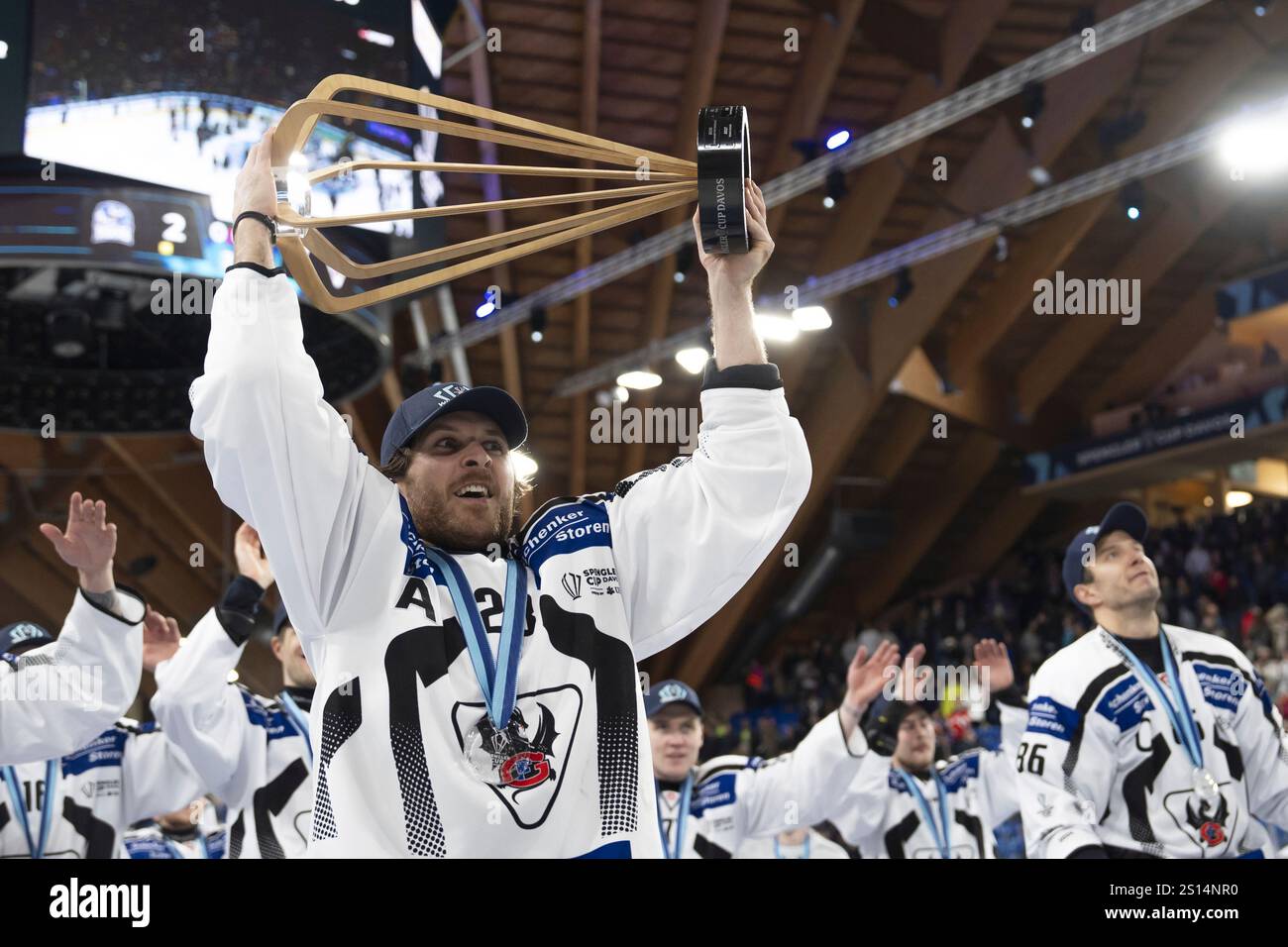 Fribourg's Christoph Bertschy, front, and his teammates celebrate ...