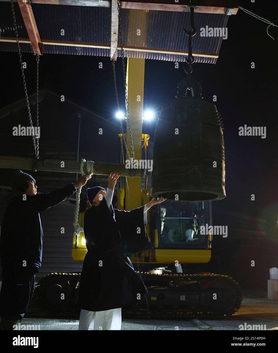The New Year's Eve Bell, hung by heavy machinery, is ready to ring 108 ...
