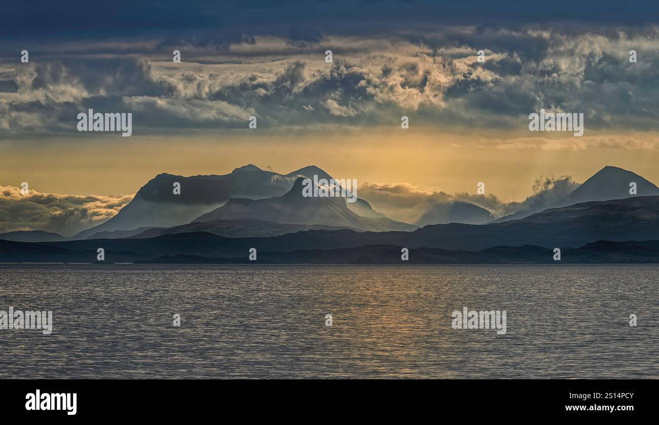 Sunrise over the Assynt mountains - taken from the Calmac ferry as it ...