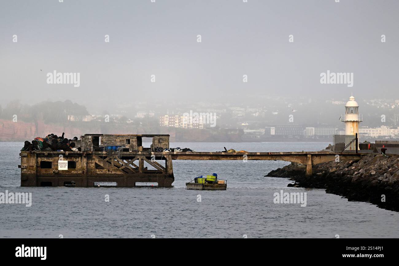 Harbour, Brixham, Devon, UK. 25th Dec 2024. A view of the old wrecked ...