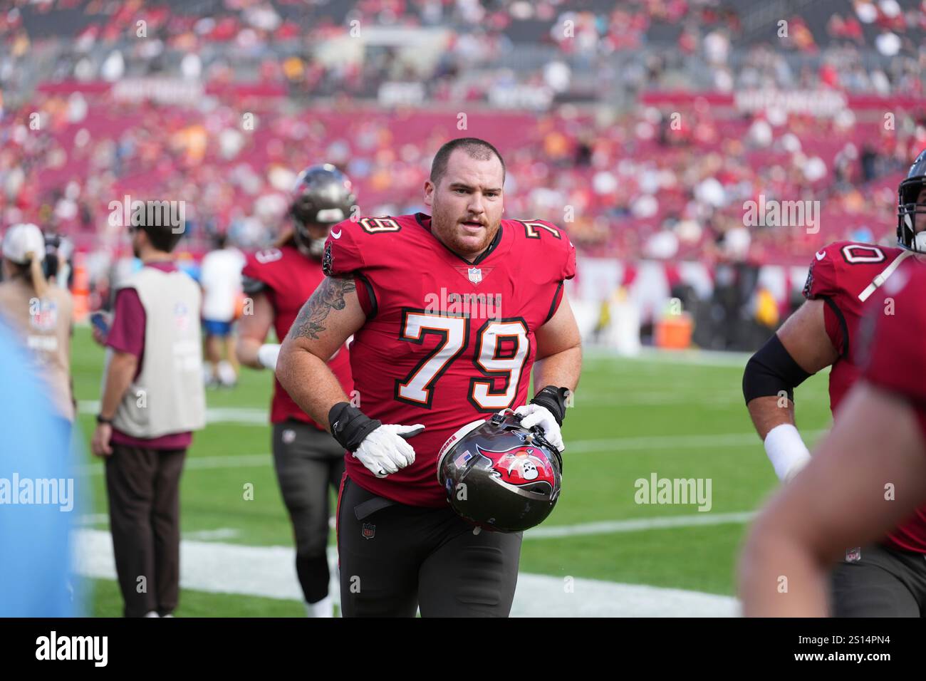 Tampa Bay Buccaneers guard Elijah Klein (79) leaves the field following ...
