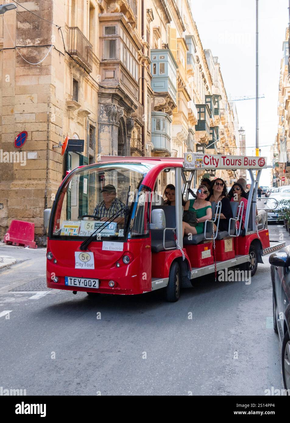 Valletta city bus tour bus Stock Photo - Alamy