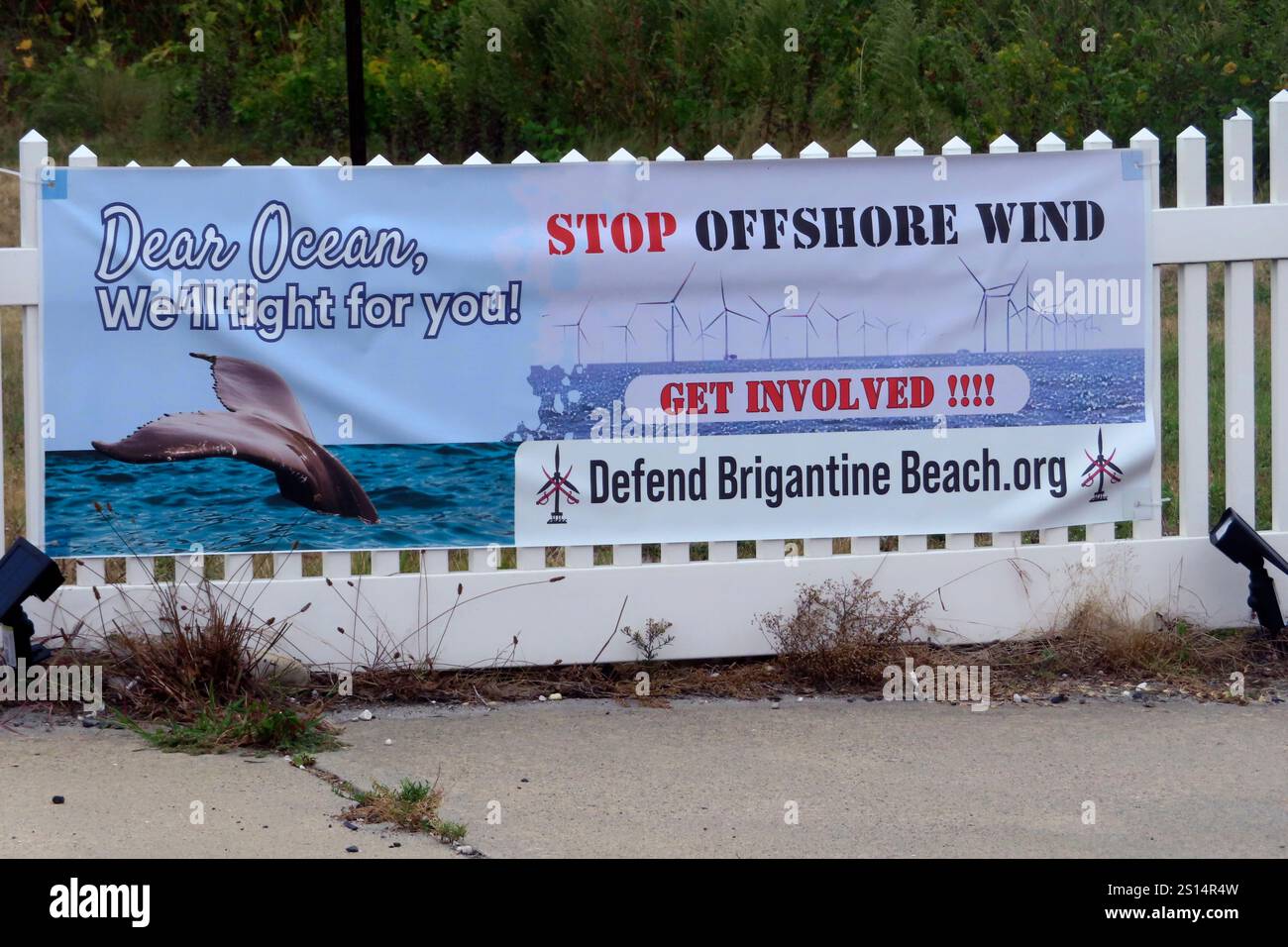 In this Sept. 18, 2024 file photo, an anti-offshore wind sign is draped ...