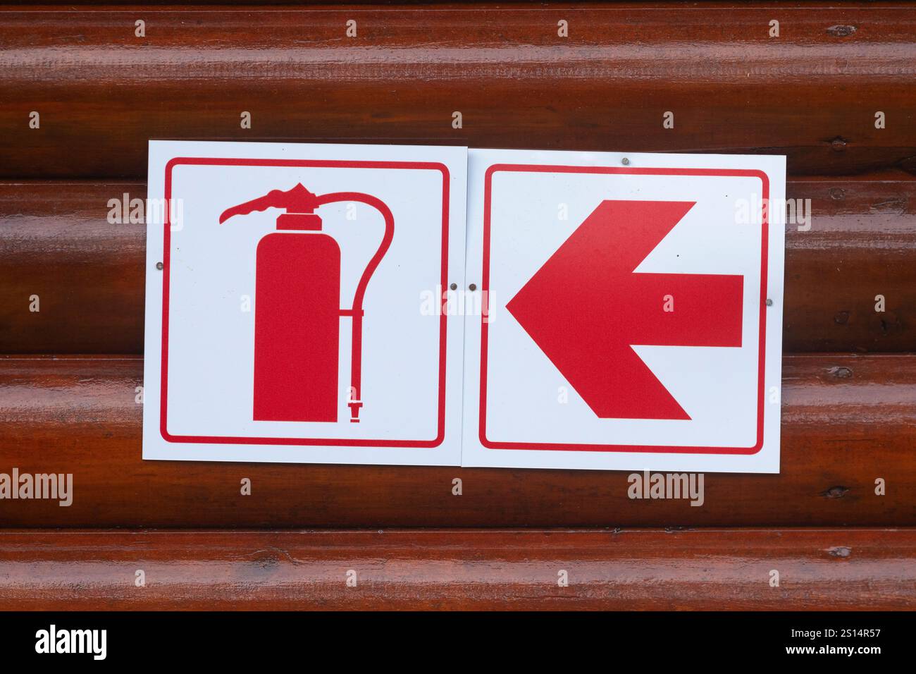 Sign on timber cabin showing a Fire Hydrant with directional arrow to ...