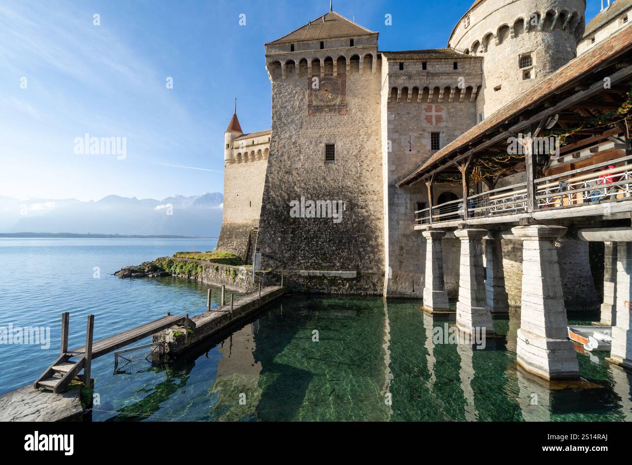 Chillon Castle or Chateau de Chillon is a famous castle located on Lake ...
