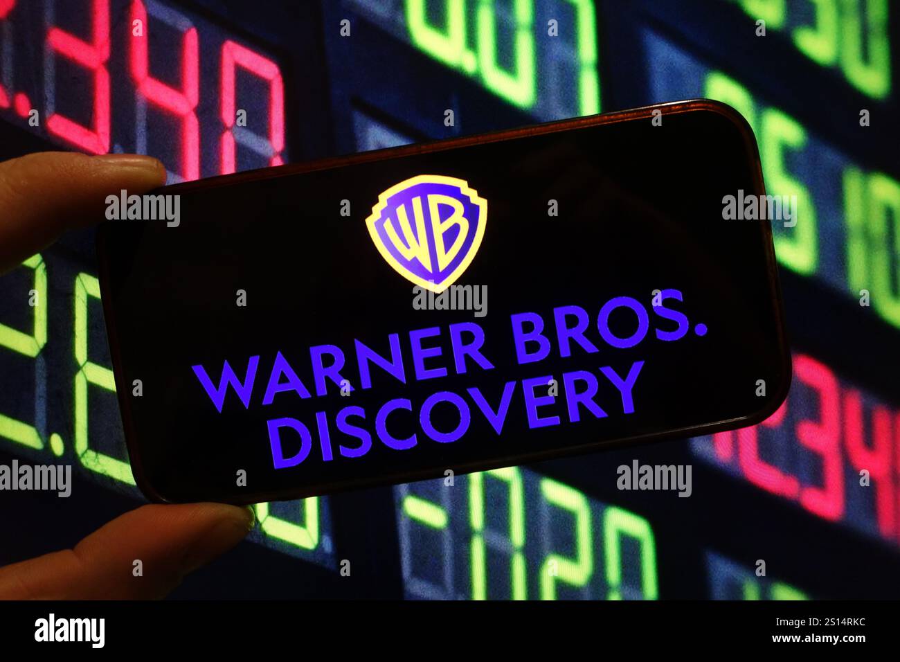 In this photo illustration, the Warner Bros Discovery company logo is ...