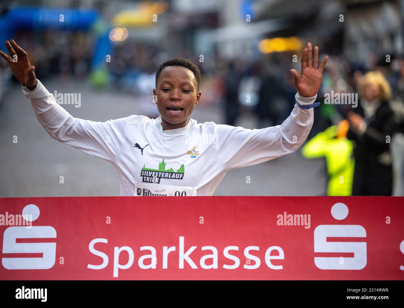 Trier, Germany. 31st Dec, 2024. Emeline Imanizabayo from Rwanda crosses ...