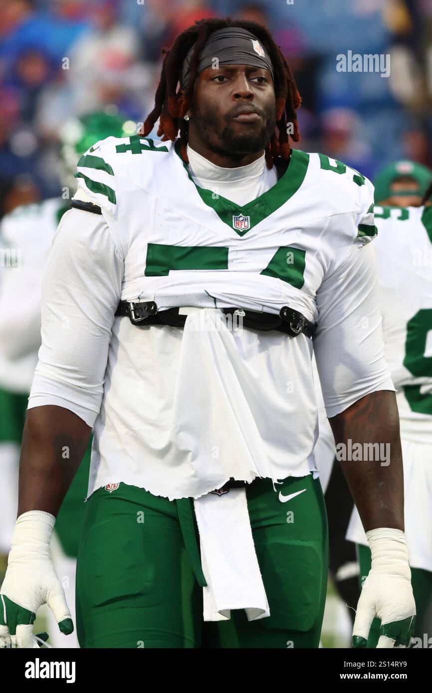 New York Jets defensive tackle Javon Kinlaw (54) walks off field prior ...