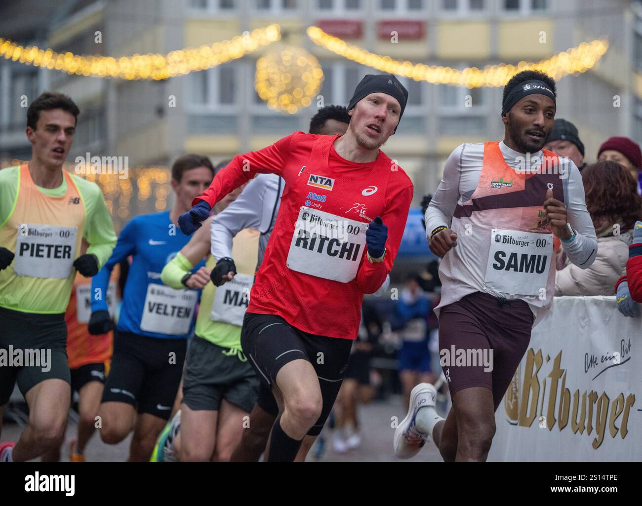 Trier, Germany. 31st Dec, 2024. The German runners Samuel Fitwi ...