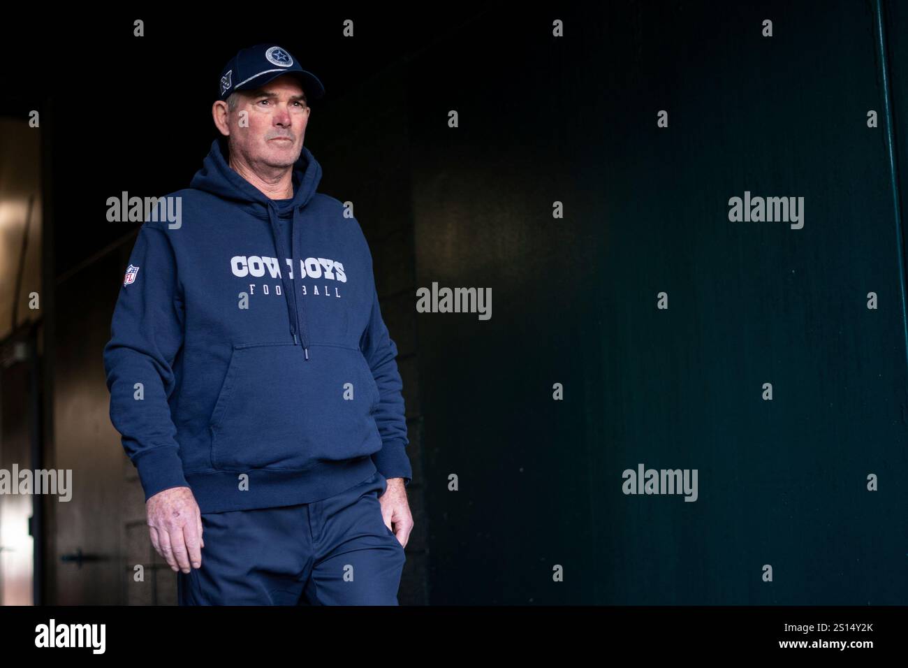 Dallas Cowboys defensive coordinator Mike Zimmer looks on during warm ...