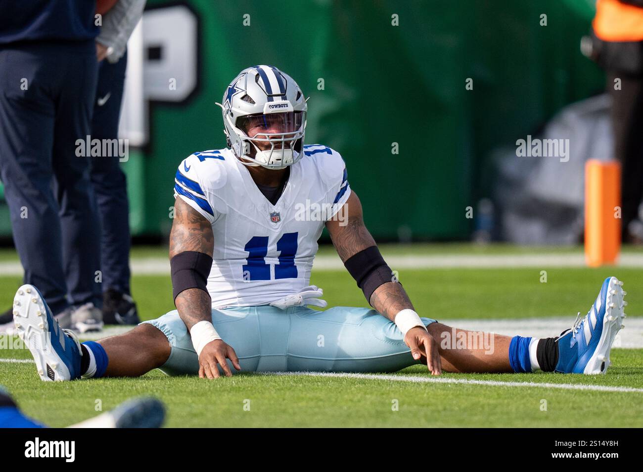 Dallas Cowboys linebacker Micah Parsons (11) stretches during warm-ups ...