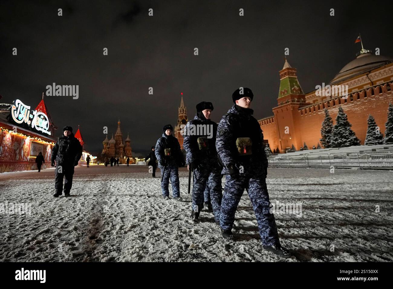 Police and the Rosguardia (National Guard) servicemen walk in Red ...