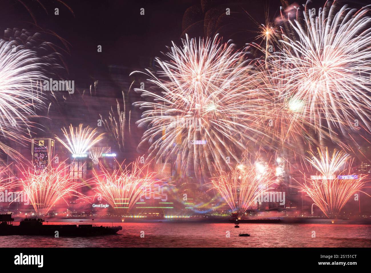 Fireworks explode over Victoria Harbour to celebrate the start of 2025 ...