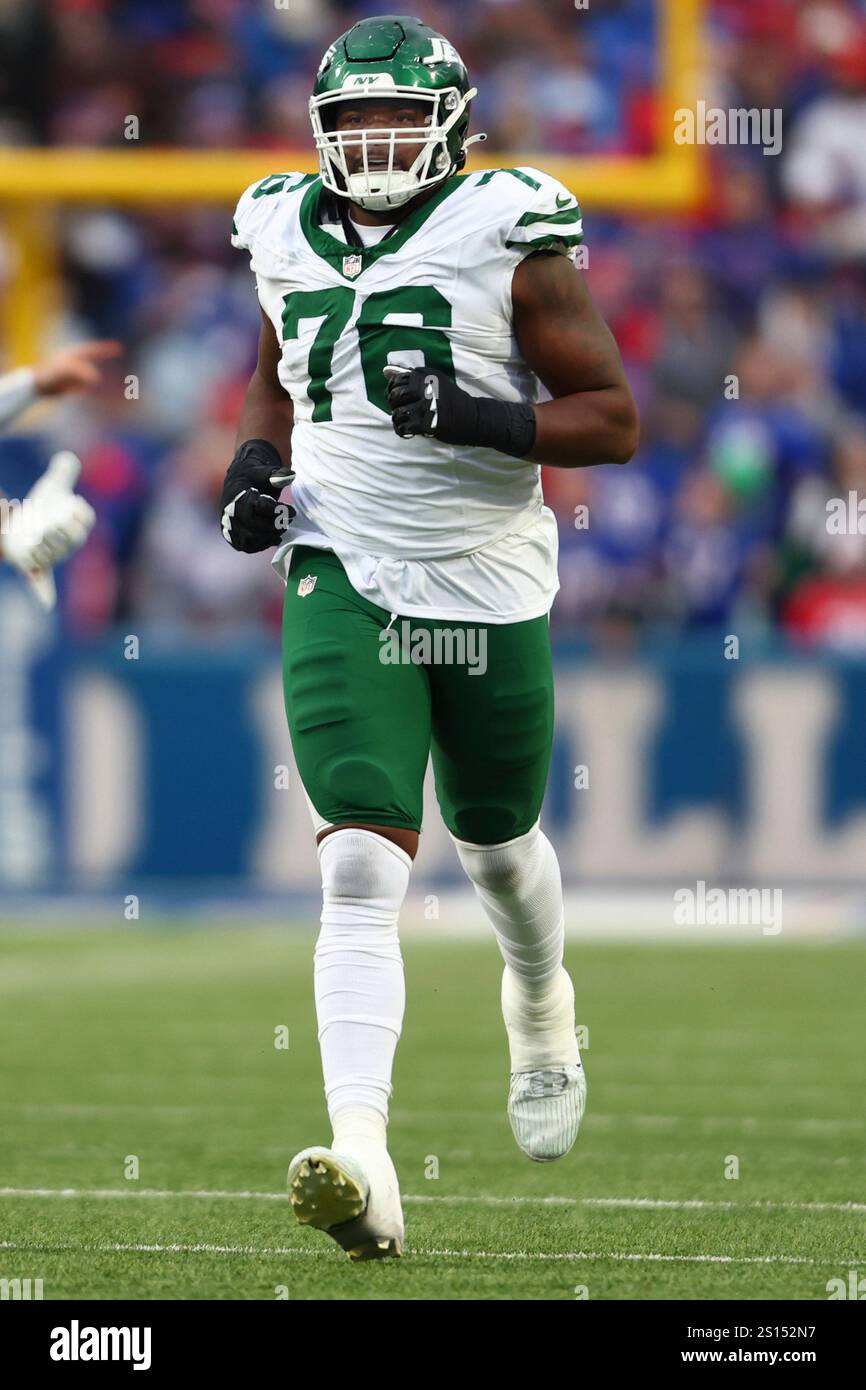New York Jets offensive tackle Morgan Moses (78) runs up field during ...