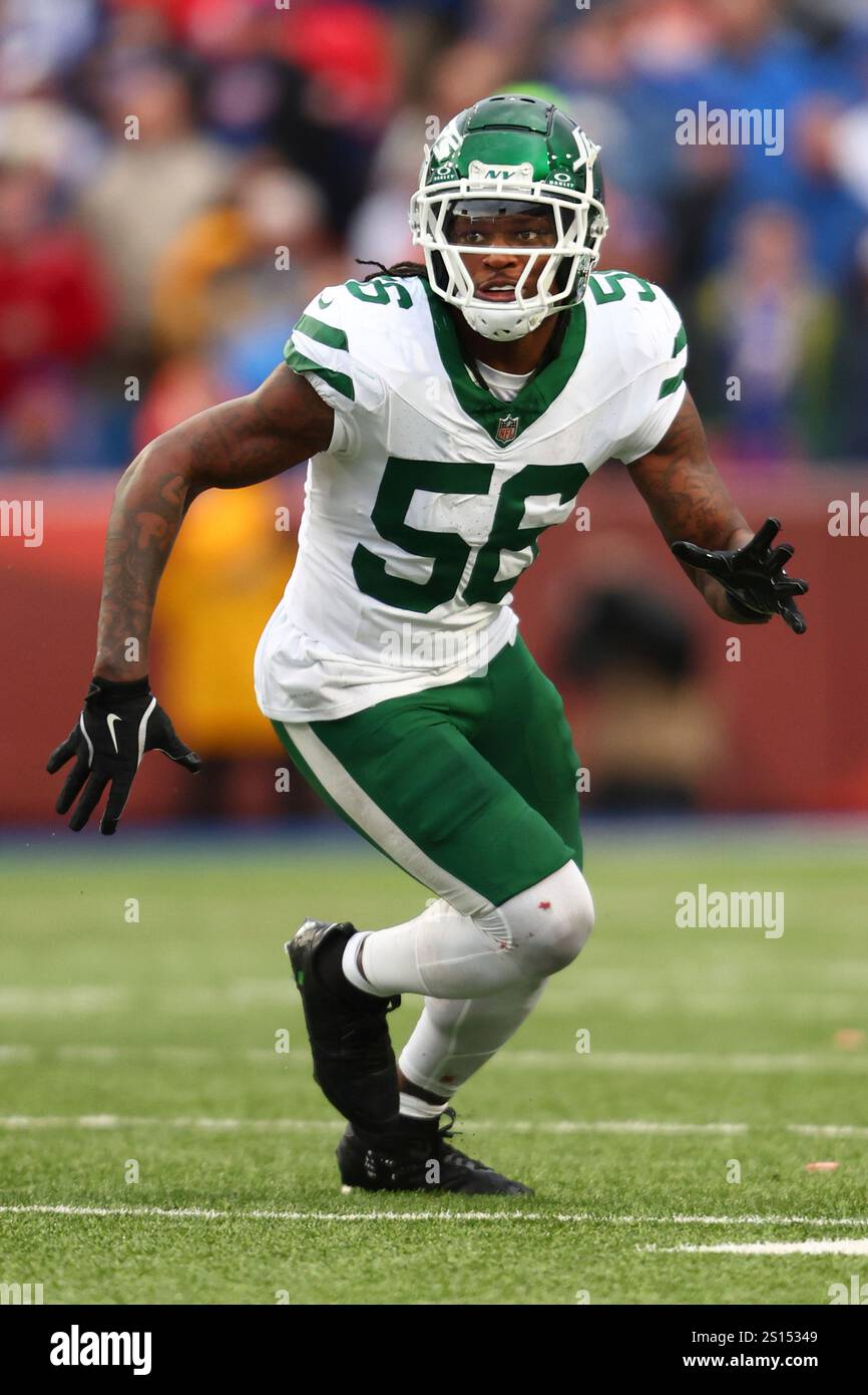 New York Jets linebacker Quincy Williams (56) rushes during the first ...