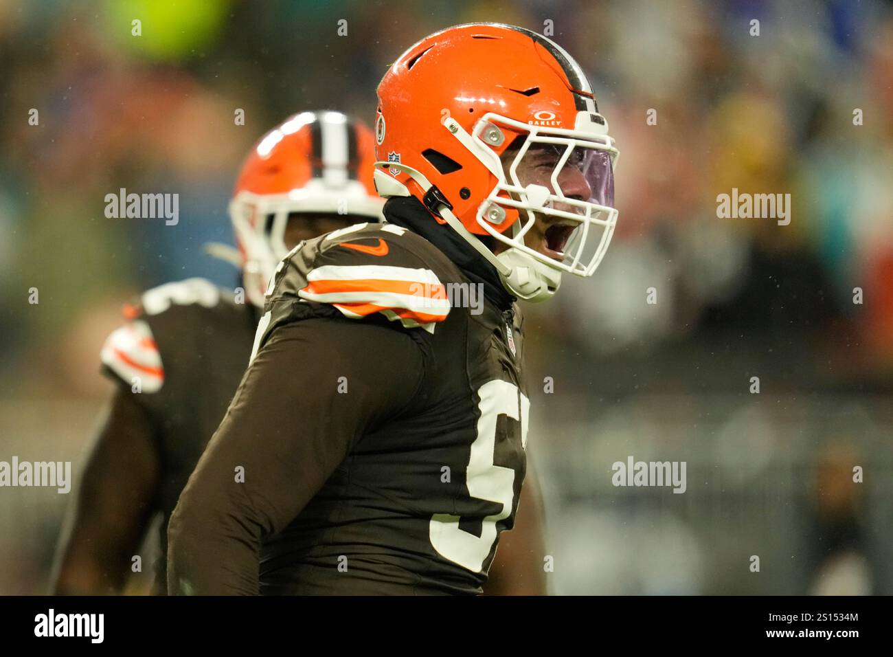 Cleveland Browns defensive end Isaiah McGuire celebrates a sack in the ...