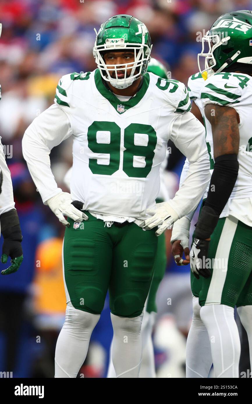 New York Jets defensive tackle Bruce Hector (98) looks on during the first half of an NFL ...