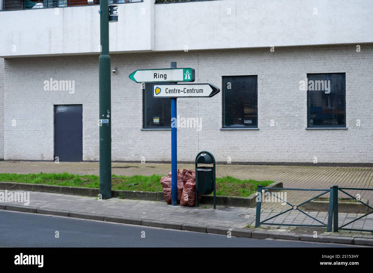 Traffic direction signs and Fly-tipping at the Albert I square in ...