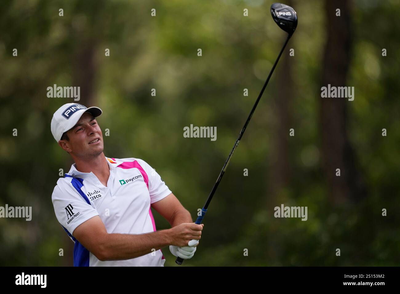 FILE - Viktor Hovland, of Norway, hits off the second tee during the third round of the BMW ...